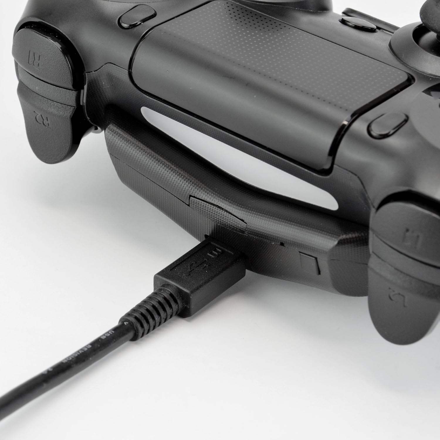 Details and images for Game Tech's DualShock 4 battery add-on accessory ...